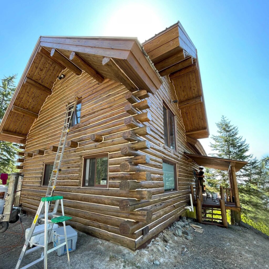 Log Home Staining Banner Elk - Baldwin Log Cabin Restoration